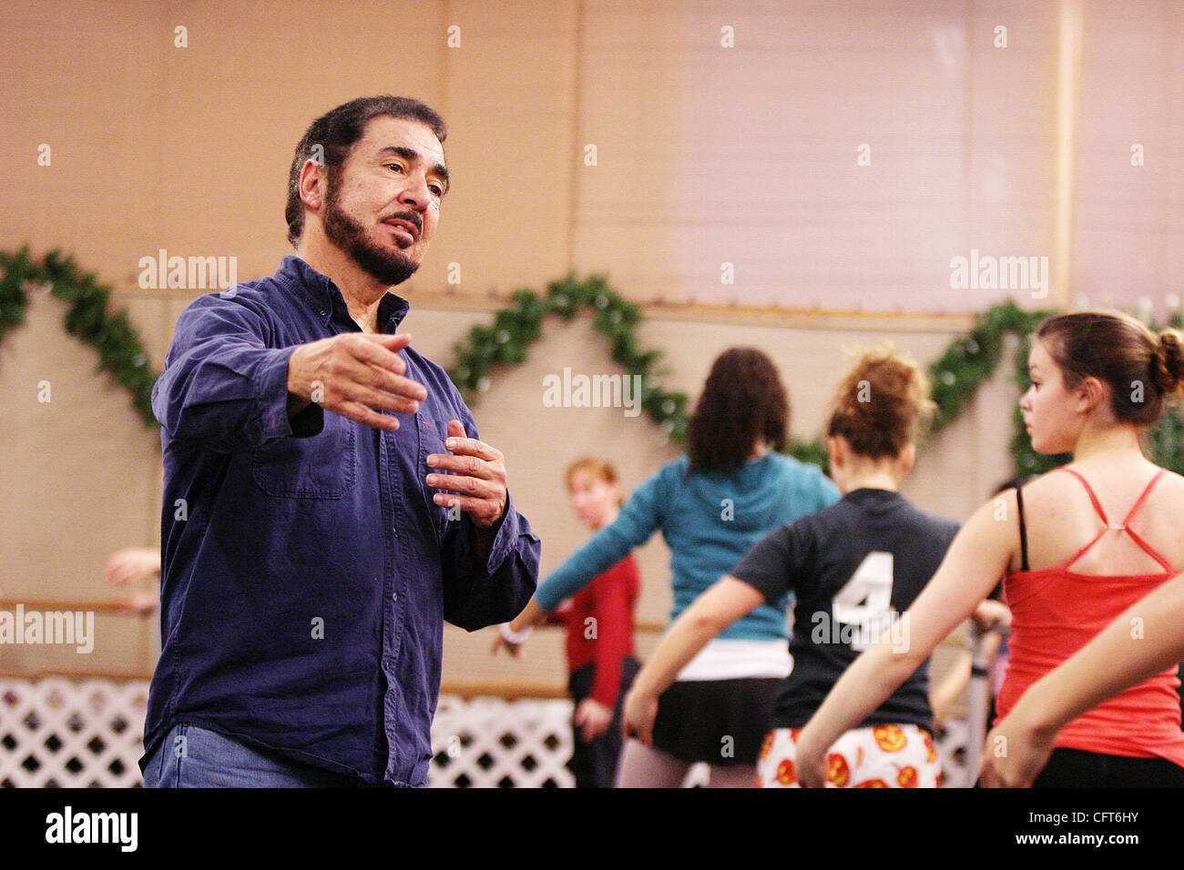 Oakland Ballet founder Ronn Guidi, left, leads his dancers through a ...