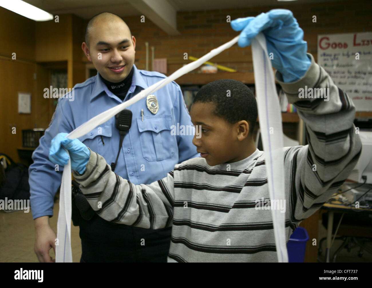 Northport third grader Trevon Starks, 8, practiced applying a bandage ...
