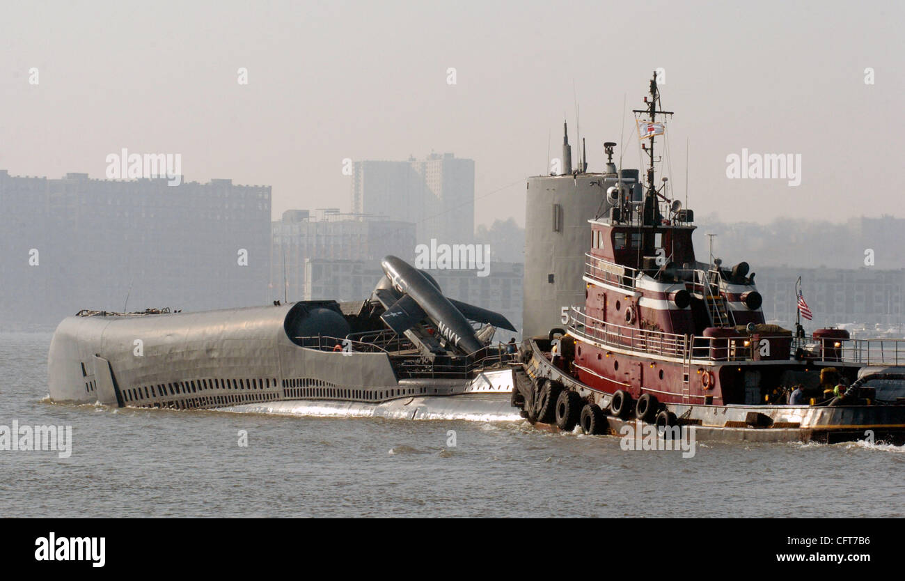 The Intrepid Sea, Air & Space Museum's Growler Submarine is towed down ...