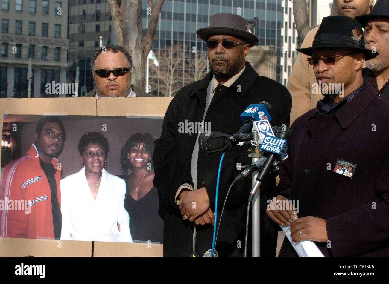William Bell, (C) the father of Sean Bell, looks on as family friend ...