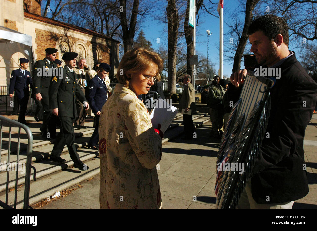 Sacramento Bee editor Amy Chance buys Schwarzenegger buttons outside ...