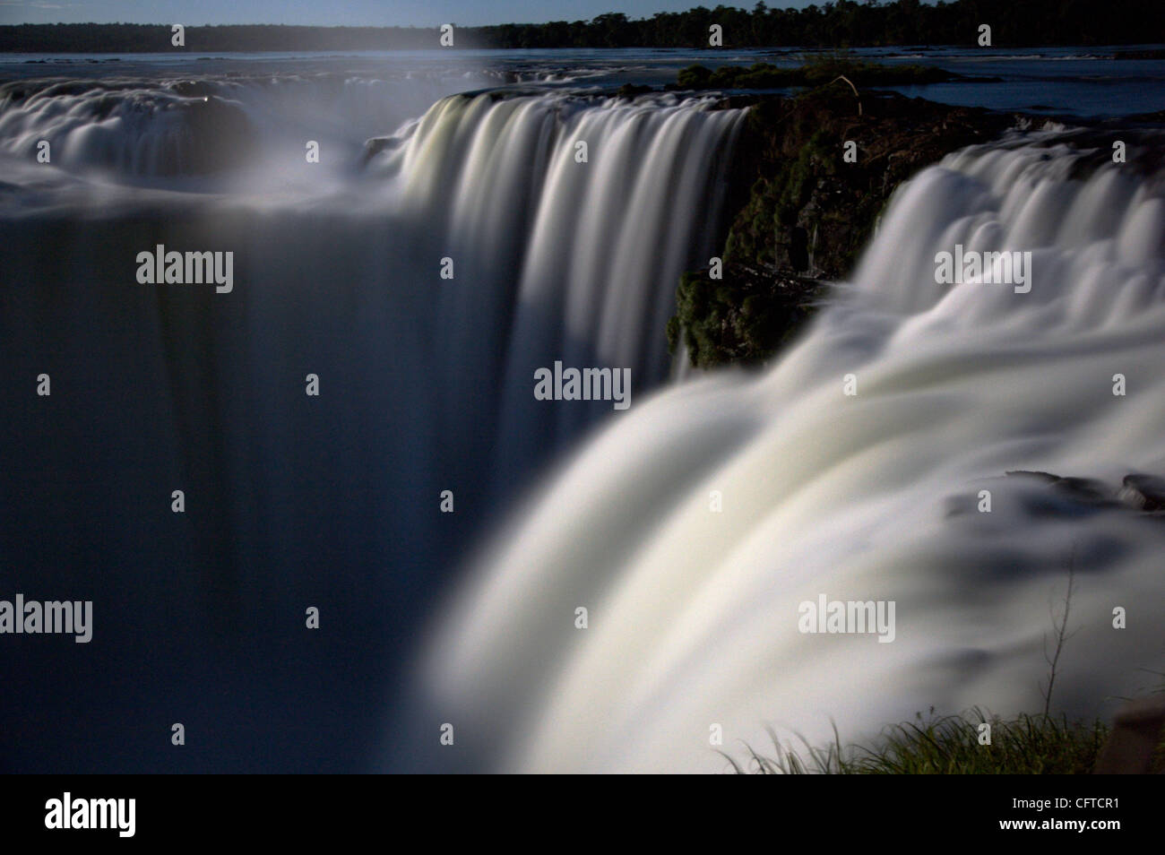 Water pours over a beautiful water fall Stock Photo - Alamy