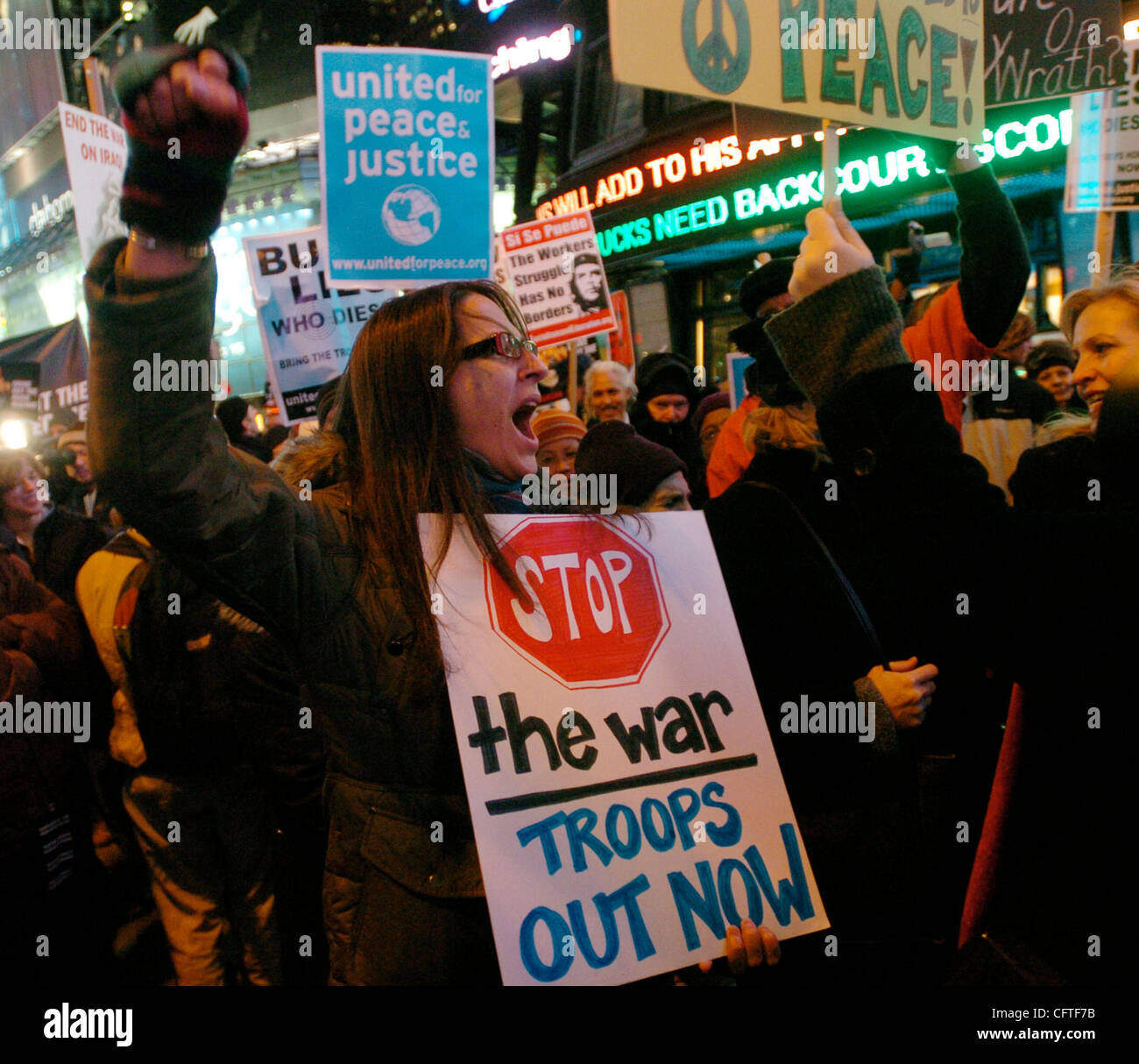 Hundreds of anti-war activists rally outside a Times Square recruiting ...