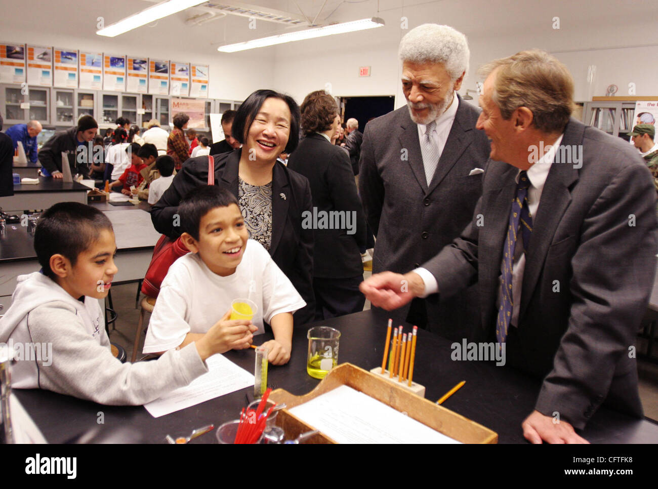 New Oakland, Calif. mayor Ron Dellums, second from right, watches as ...