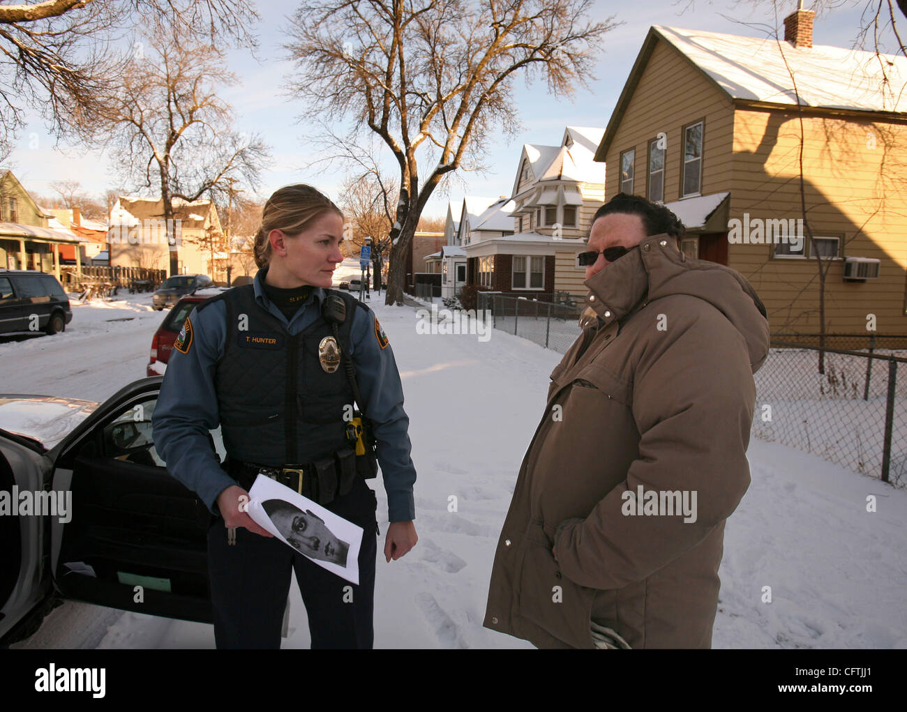 St. Paul Police Officer Tanya Hunter talked with Steve Vennemann, who ...