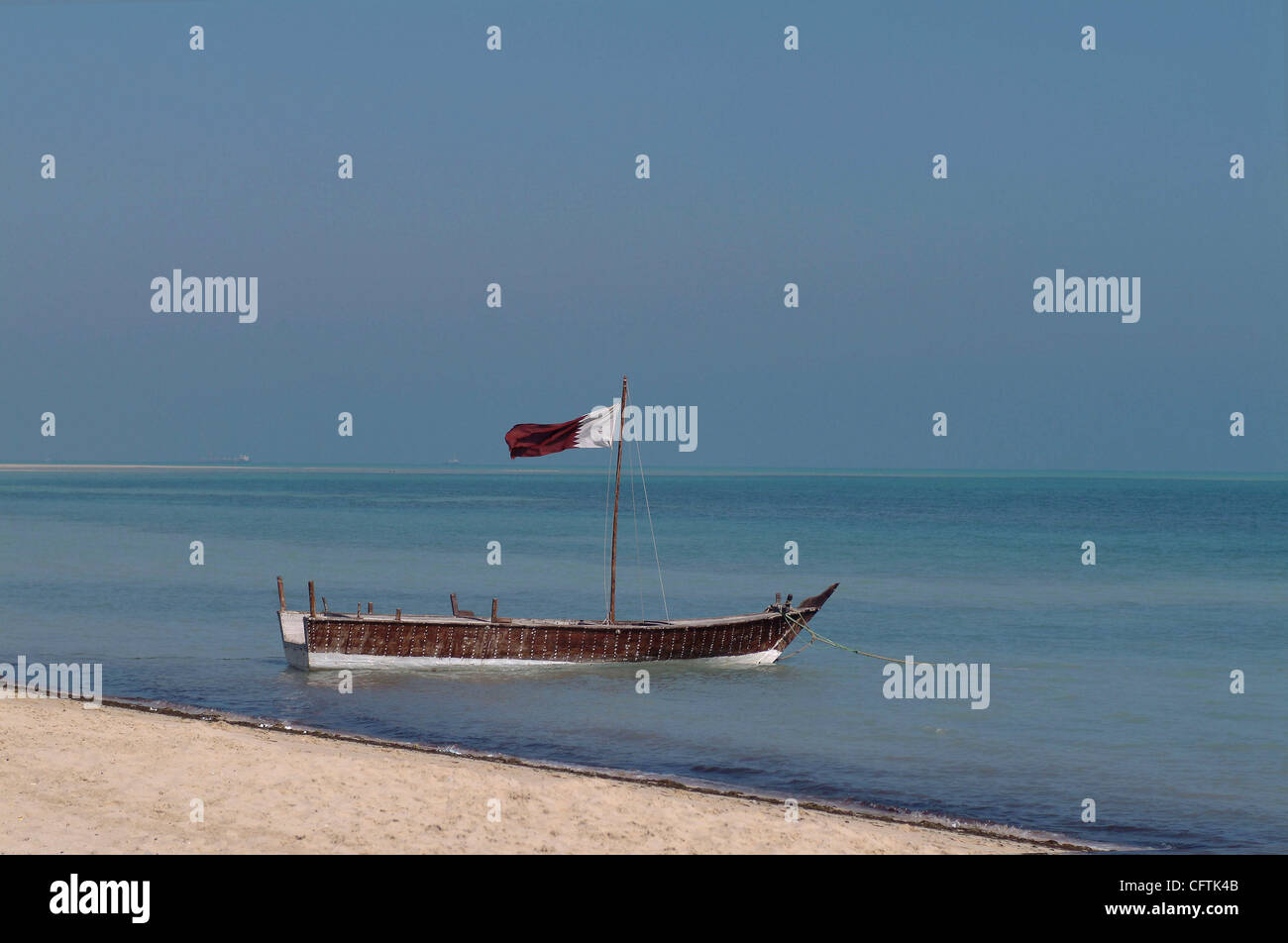 QATAR / Fishing boat with Qatar flag Stock Photo - Alamy