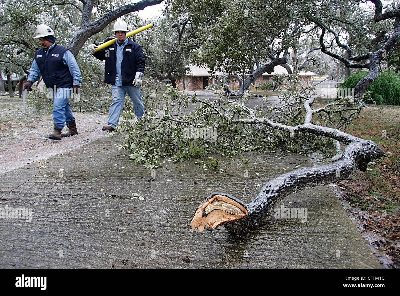 METRO ----- CPS workers Ismael (cq) Mora, left, and Kevin James make ...