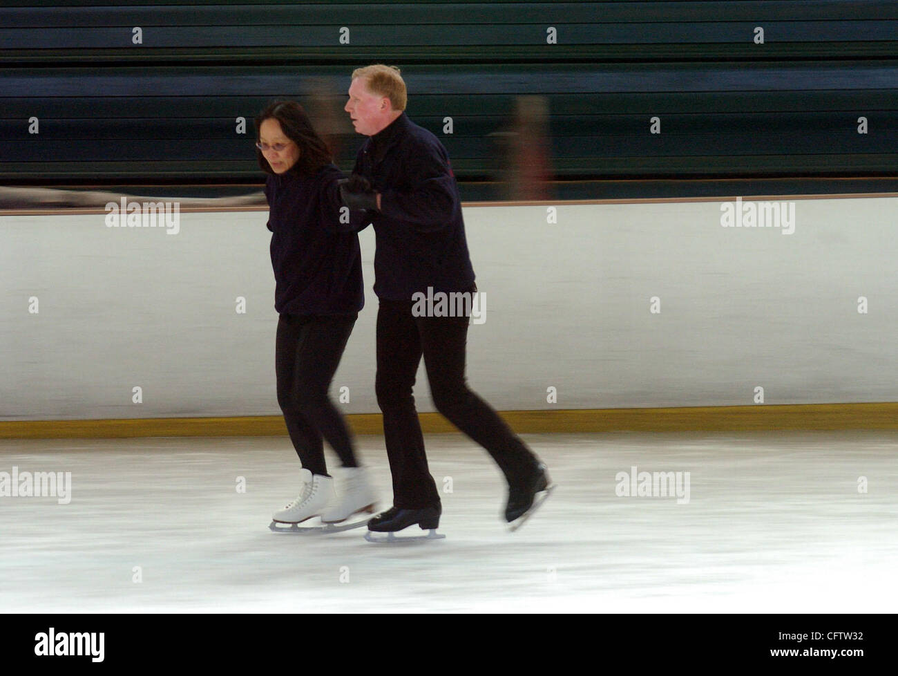 Steve Sokol and Rosa Cheung, who are both dance beginners, practice ice ...