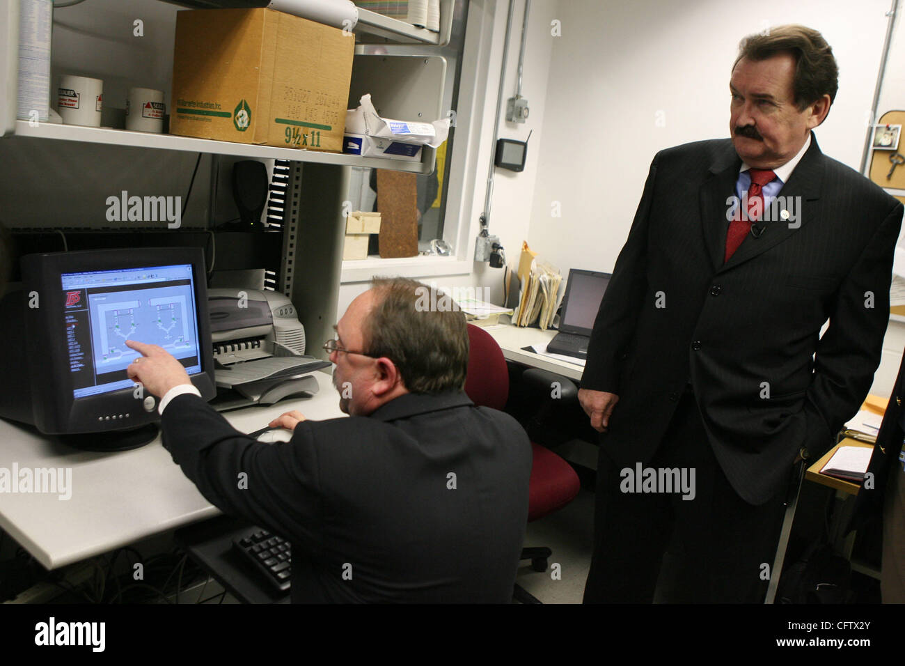 NYPA President Timothy Carey (standing) and NYPA Operations George ...