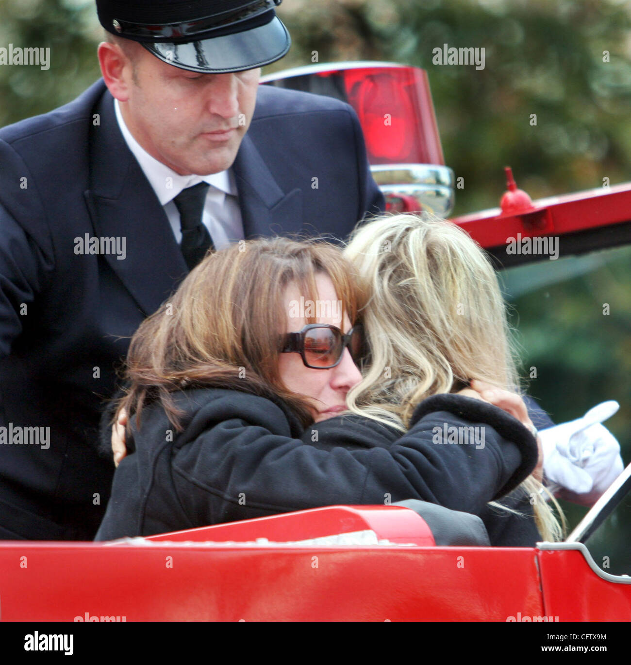 Debbie Reed, center left, wife of late Oakland Firefighter Lt. Kevin ...