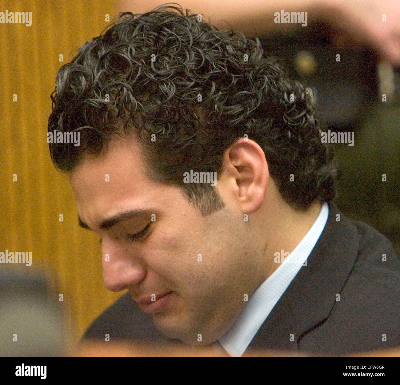 February 8, 2007, El Cajon, California, USA Jonathan M. Dallo listens ...