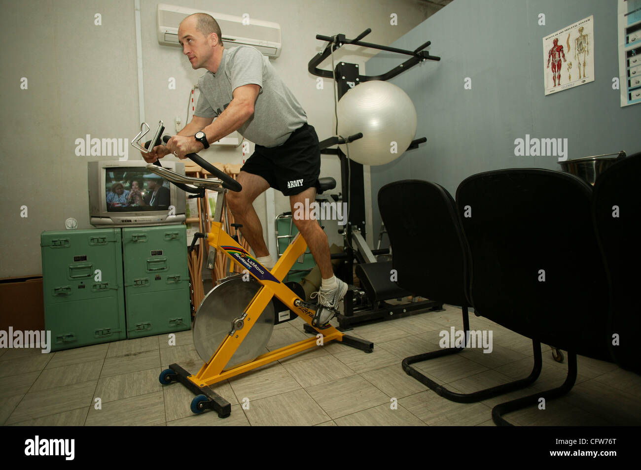 Major KELLY GILLESPIE, M.D. exercises at the Baghdad Combat Area ...