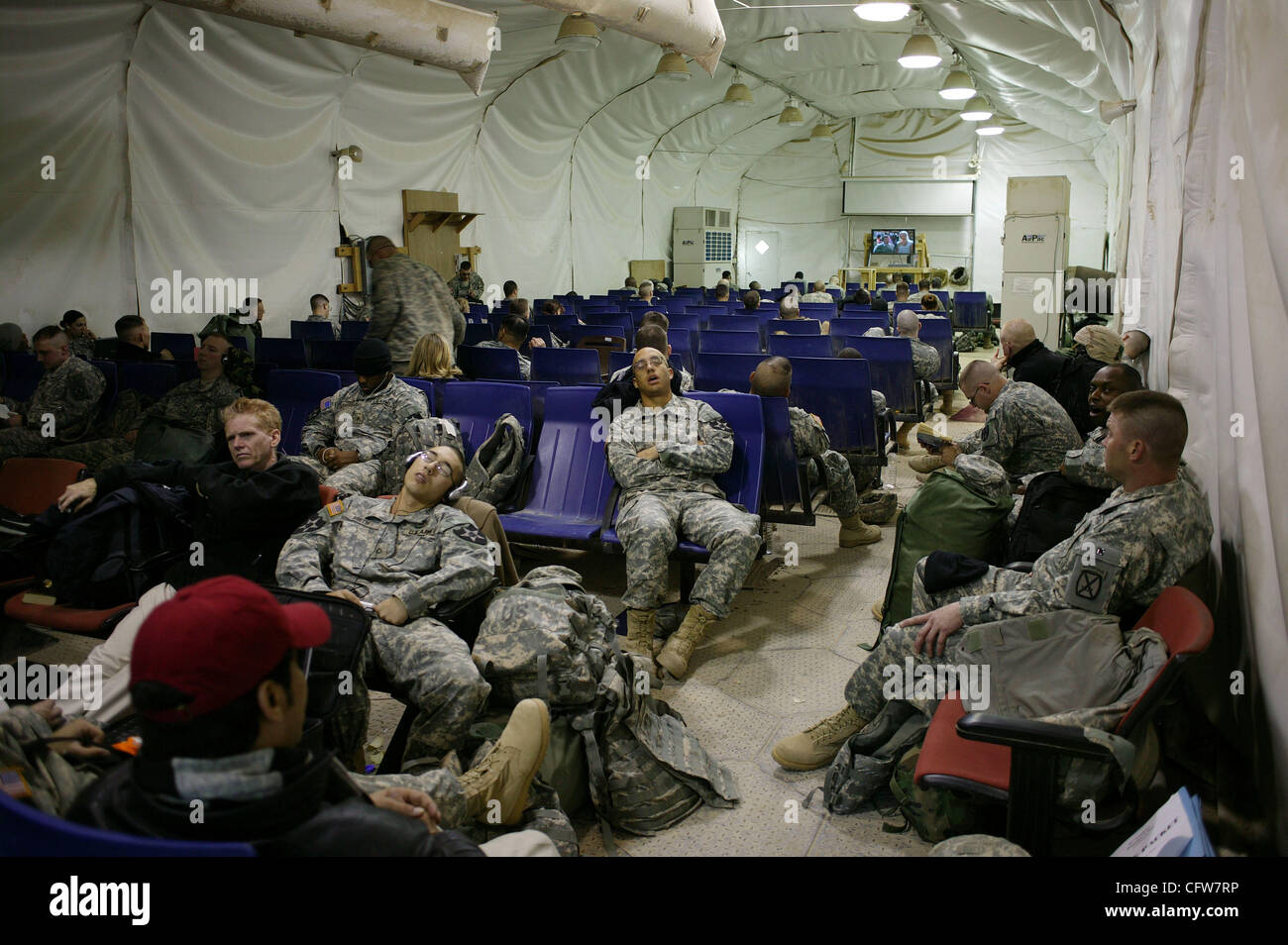 American soldiers rest and relax in a tent in Baghdad before going on ...