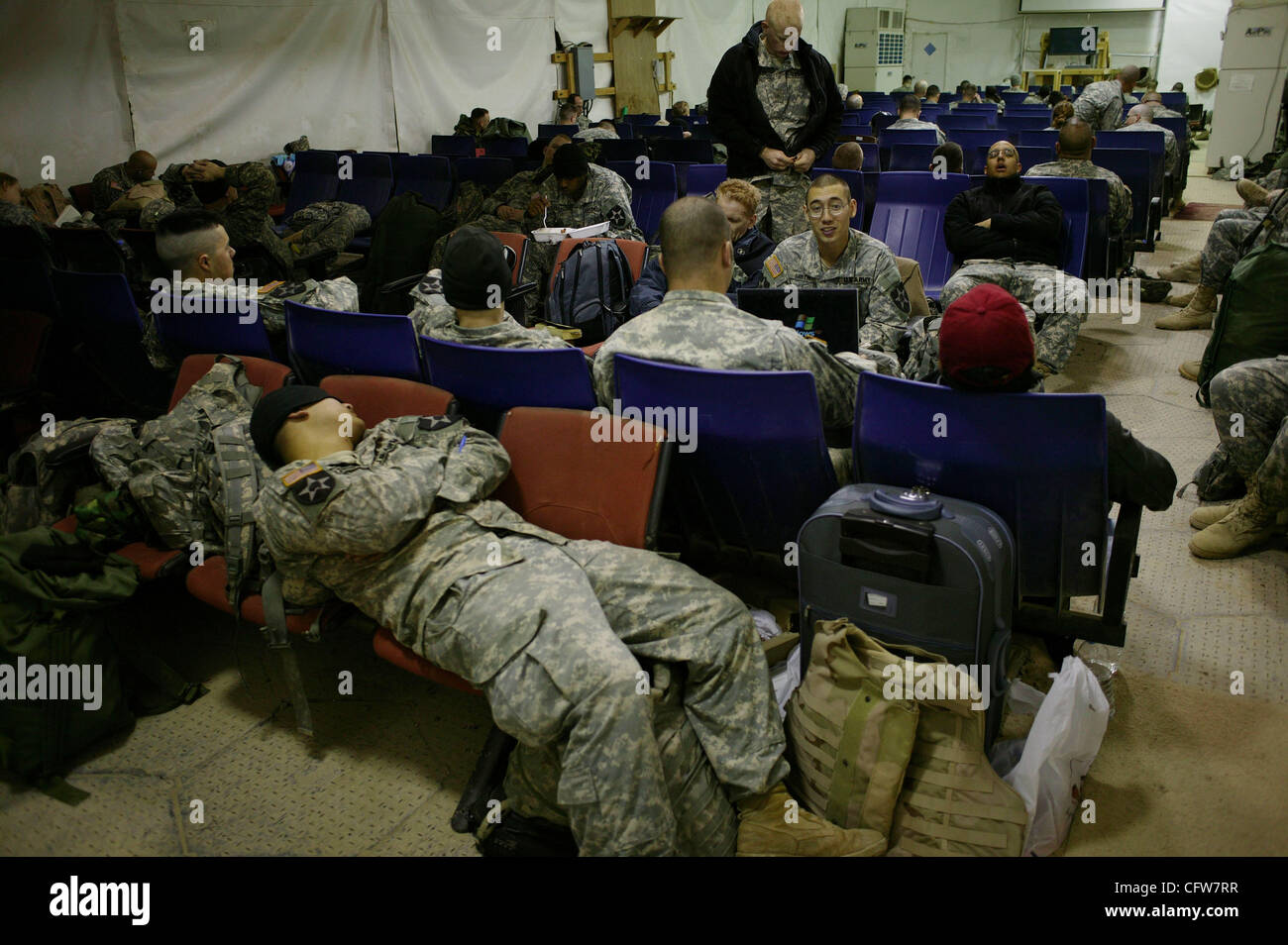 American soldiers rest and relax in a tent in Baghdad before going on ...