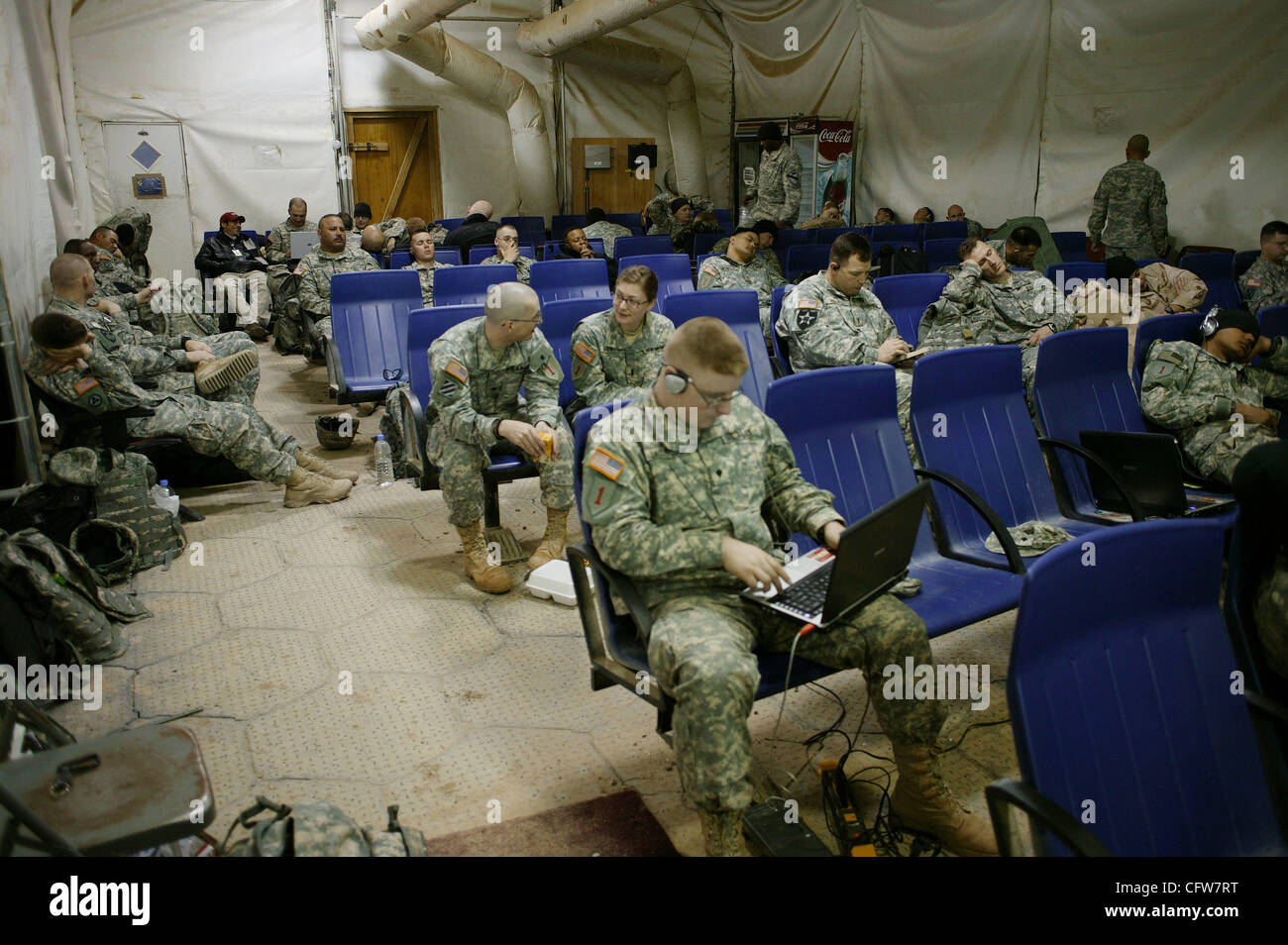 American soldiers rest and relax in a tent in Baghdad before going on ...