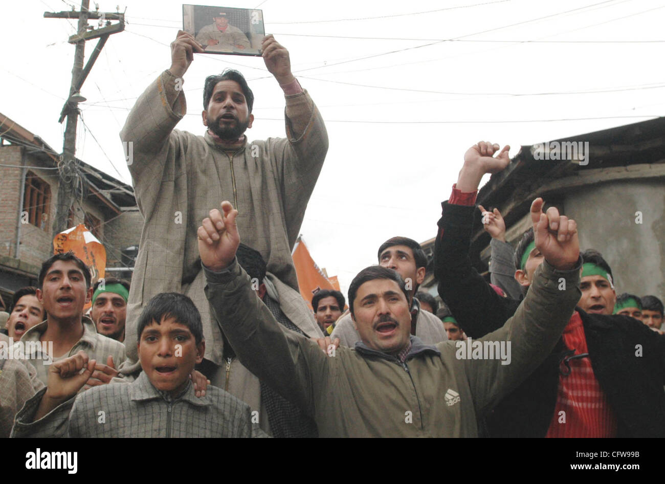 Protesters shout anti-police slogans during a demonstration in Srinagar ...