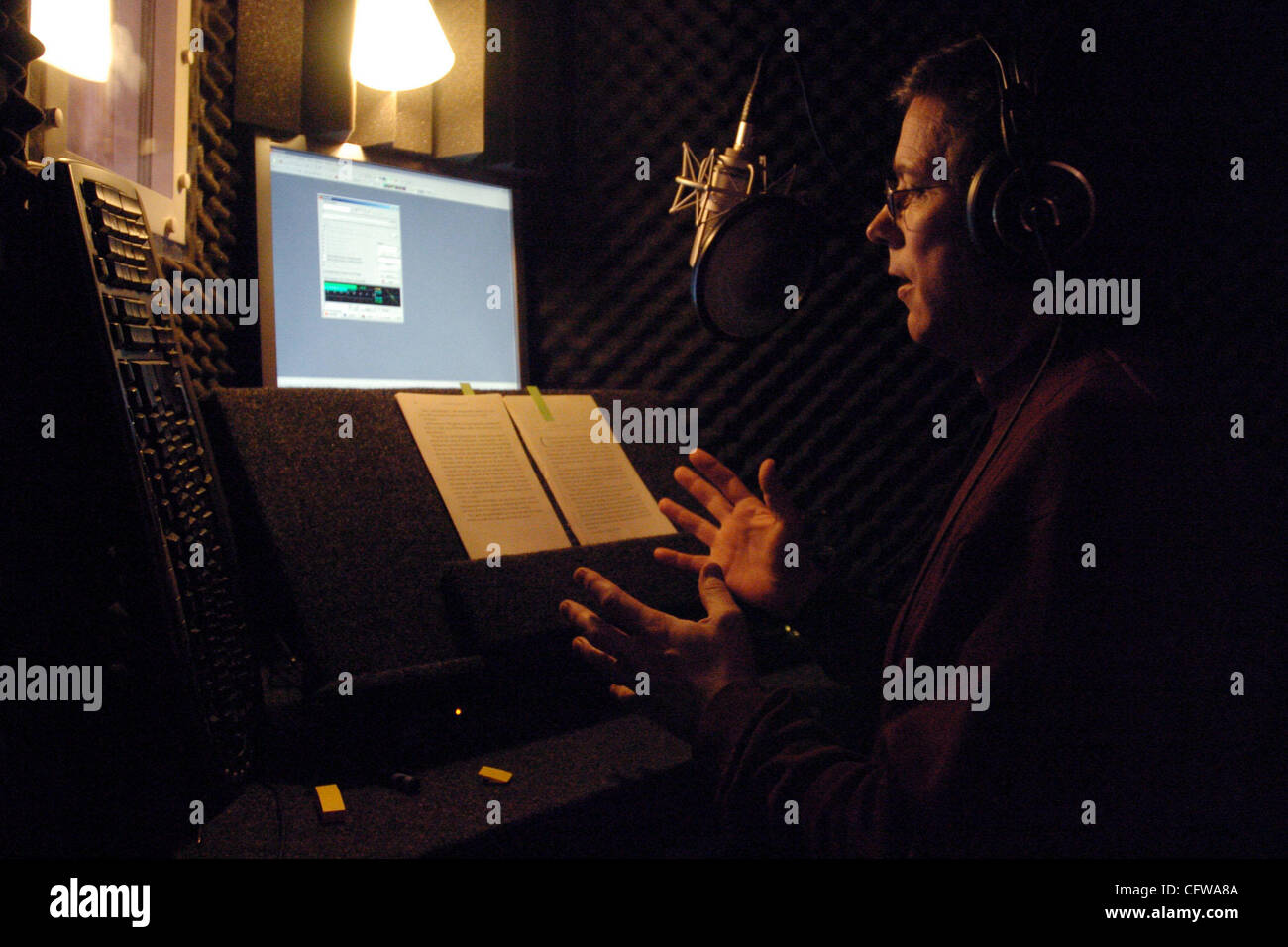 Simon Vance sits in his small studio where he narrates books at his ...