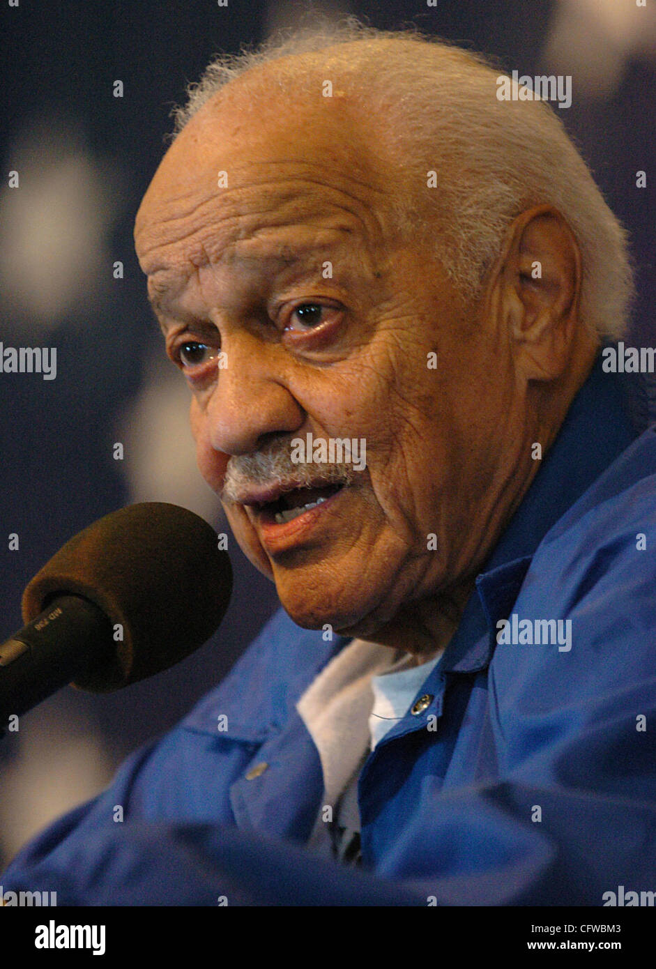 Les Williams, a Tuskegee Airman, speaks to visitors on the USS Hornet ...