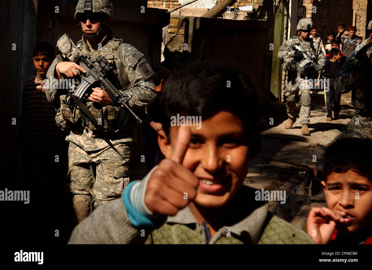 Feb 19, 2007 - Baghdad, Iraq - Spc. JOSHUA JORZ, left, from the 82nd ...