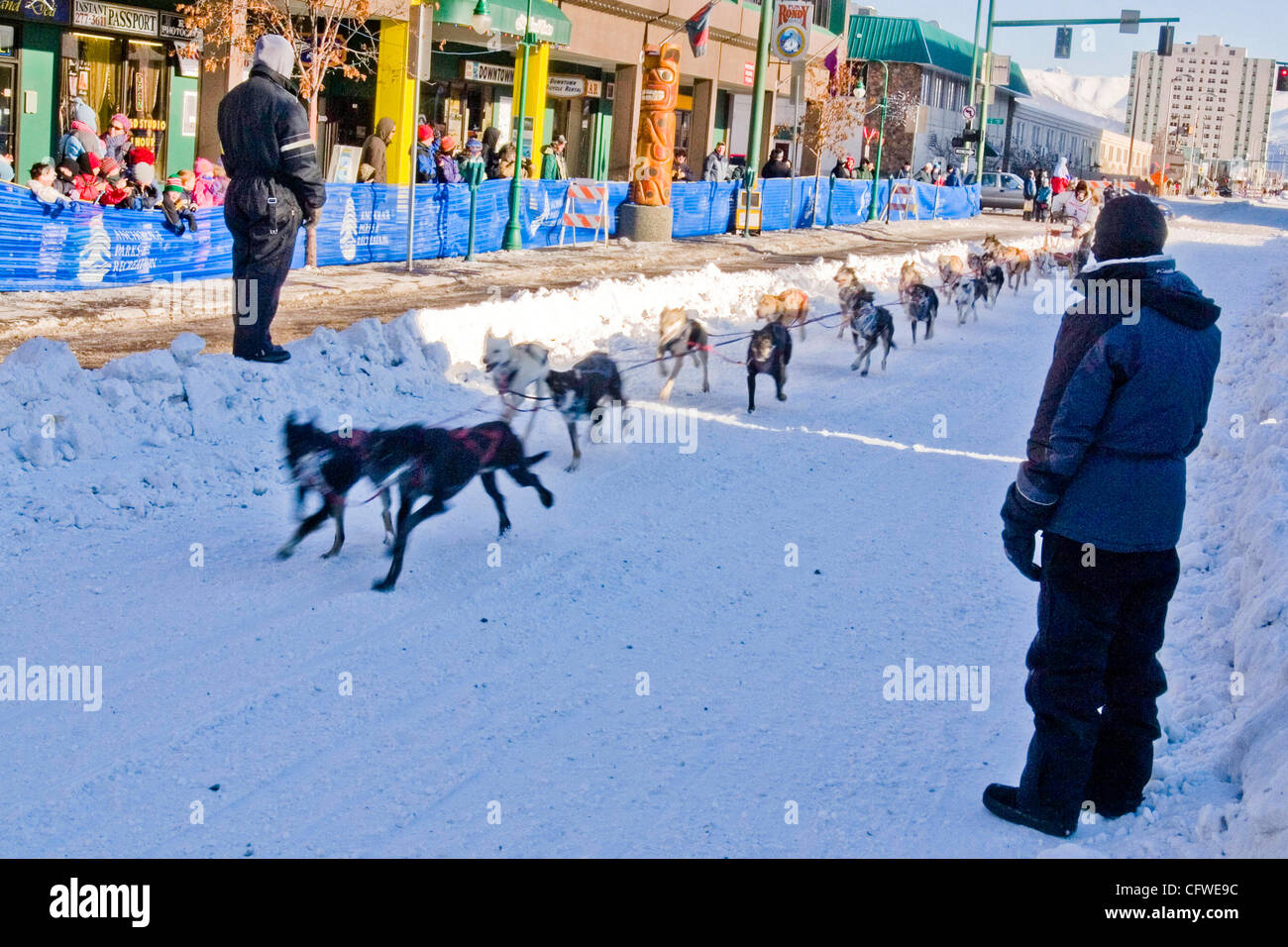 A team nears the finish line at the Anchorage Fur Rendezvous Open World ...