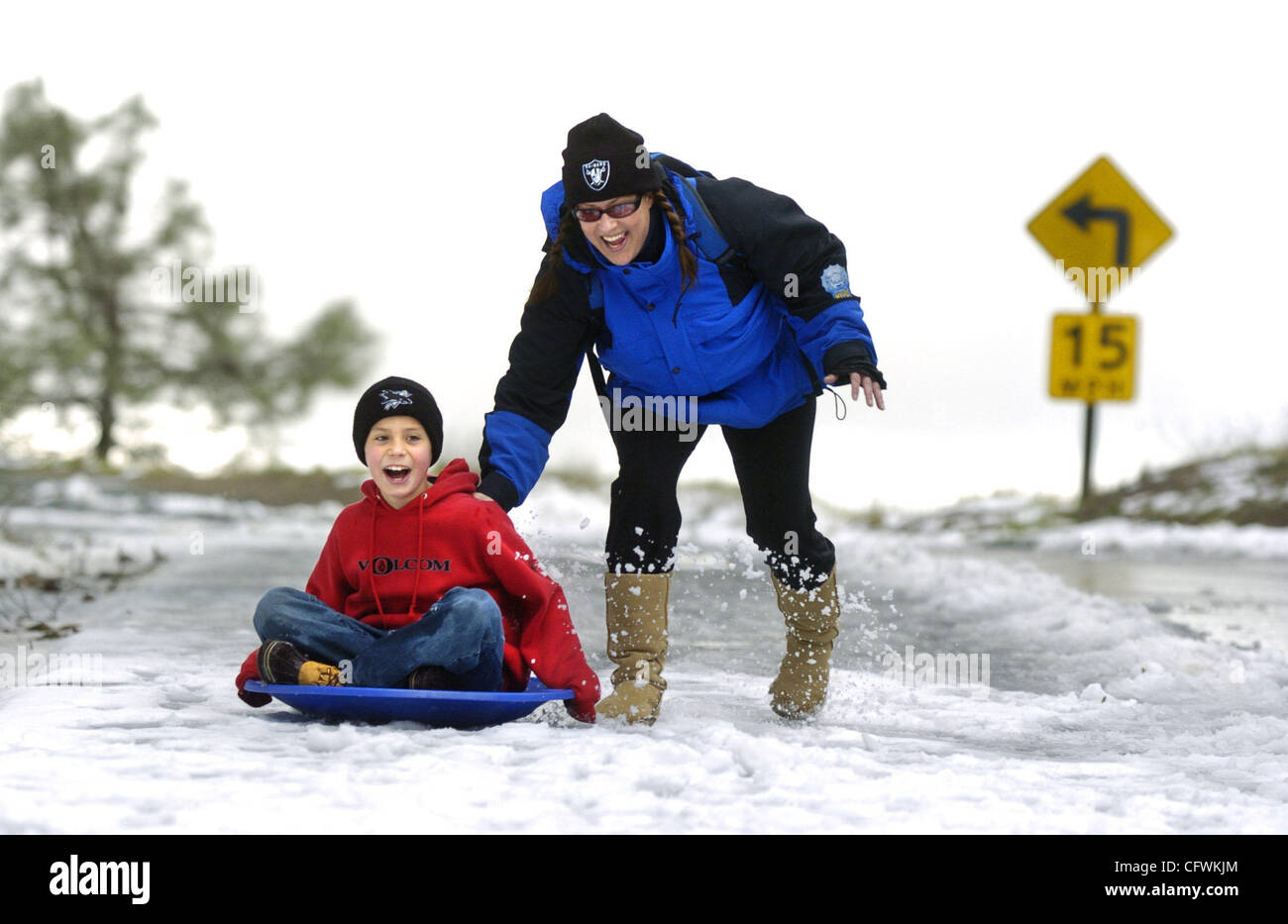 Jacob Shepherd, 9, of Antioch gets a push from his mother, Cherie, on a ...