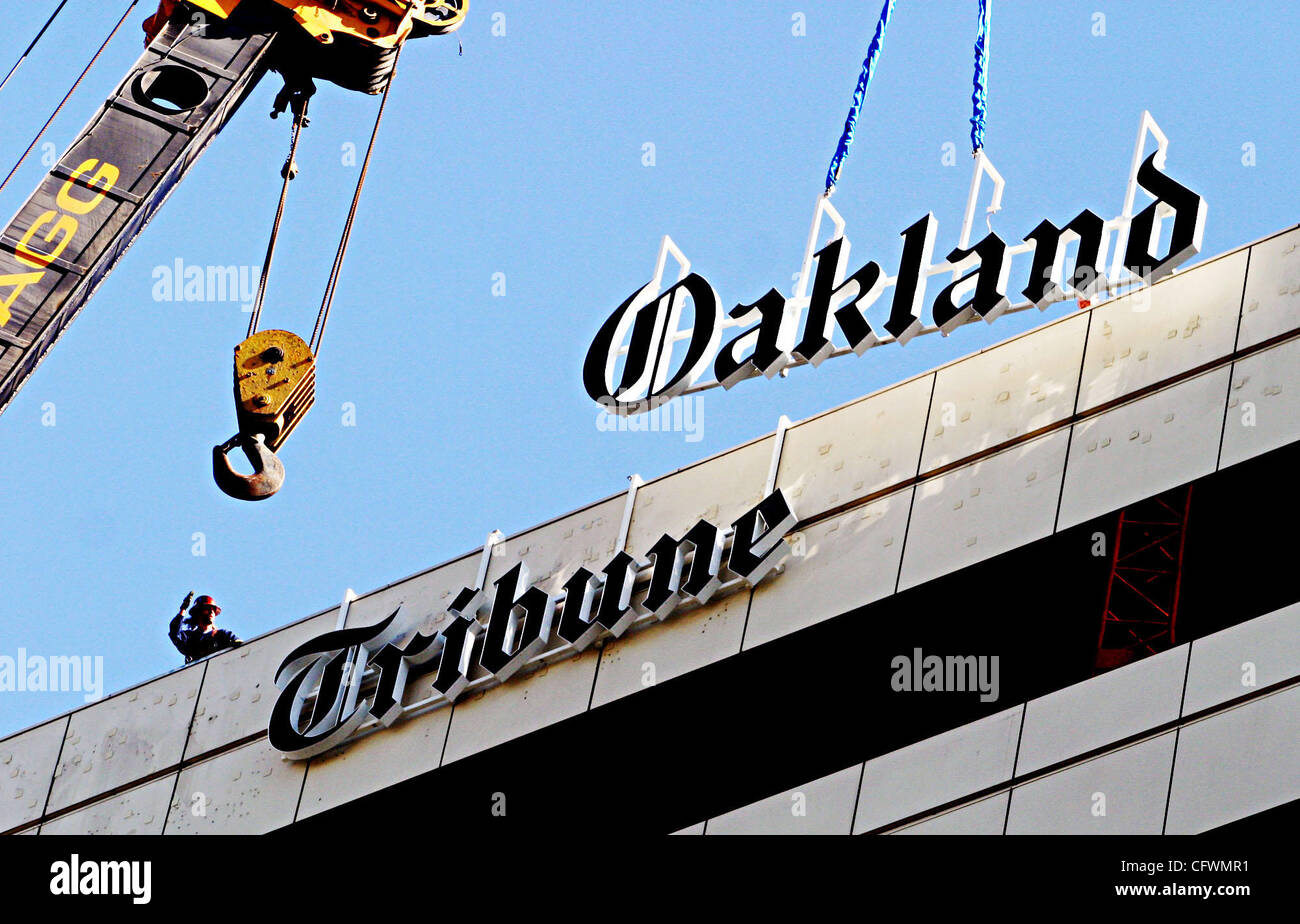 Crane on top high rise hi-res stock photography and images - Alamy