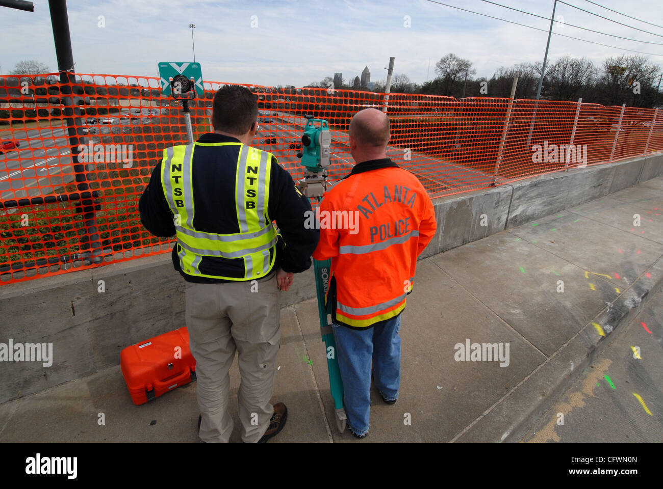 NTSB and Atlanta police accident investigators survey scene of 3/2/07 ...