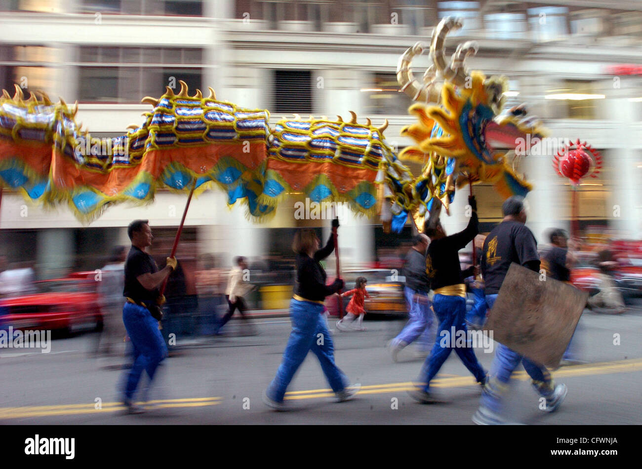 San Francisco Police Department's lion dance team move along the parade ...