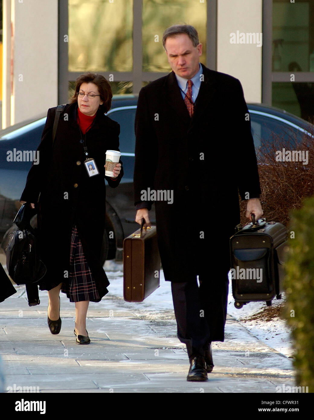 Special Prosecutor Patrick Fitzgerald, right, and an unidentified ...