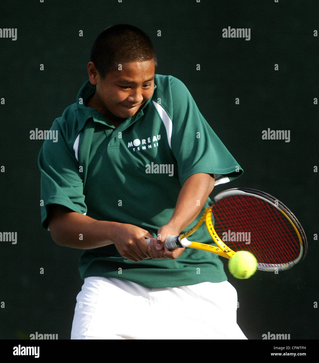 Moreau's Mark DeCastro returns a shot from Castro Valley's Jake Pawid ...