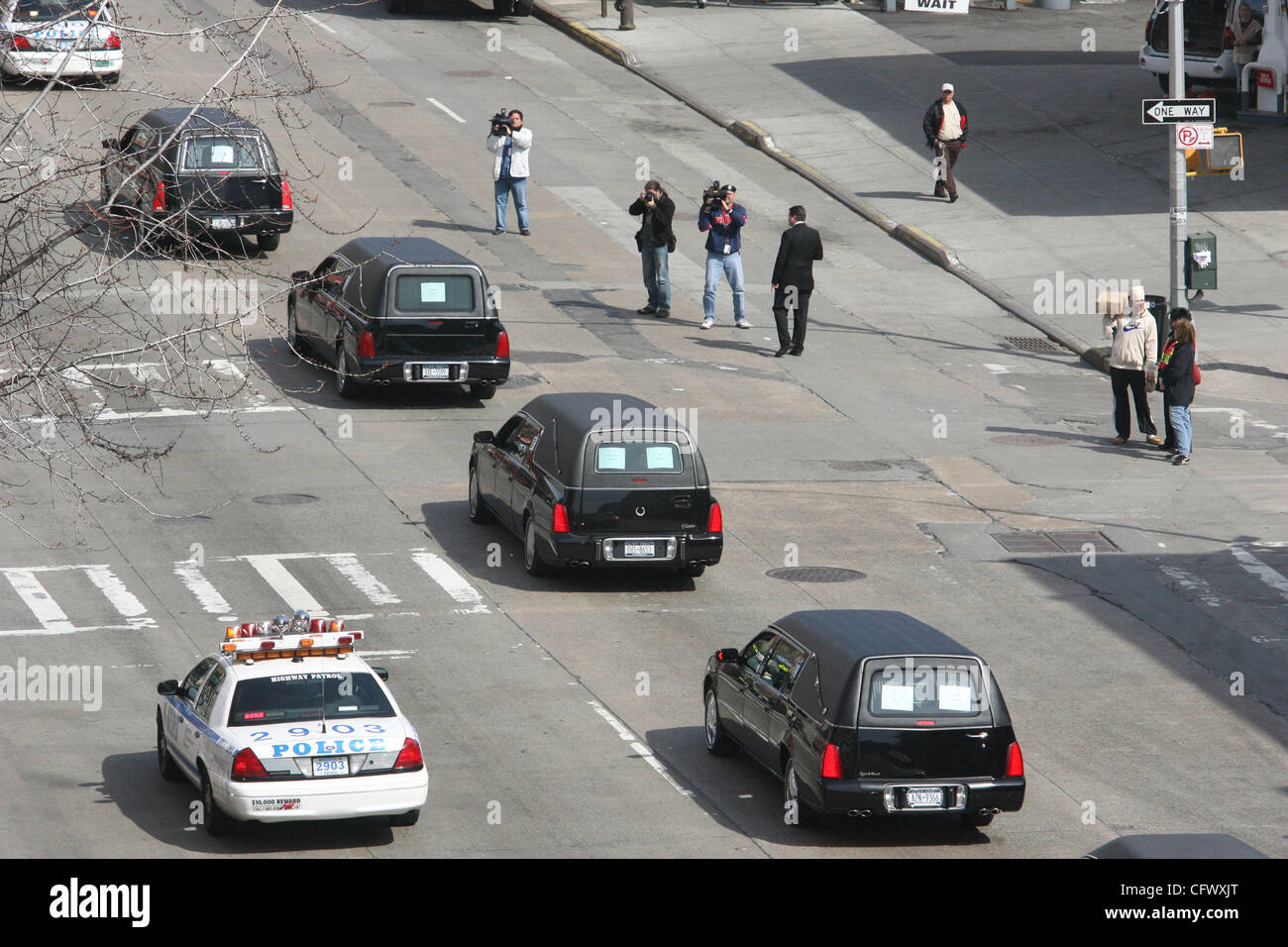 Procession leaving the funeral home along First Ave. in Manhattan ...