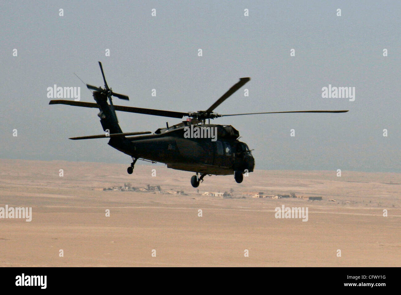 Mar 13, 2007 - Baghdad, IRAQ - A Black Hawk in the formation flies ...