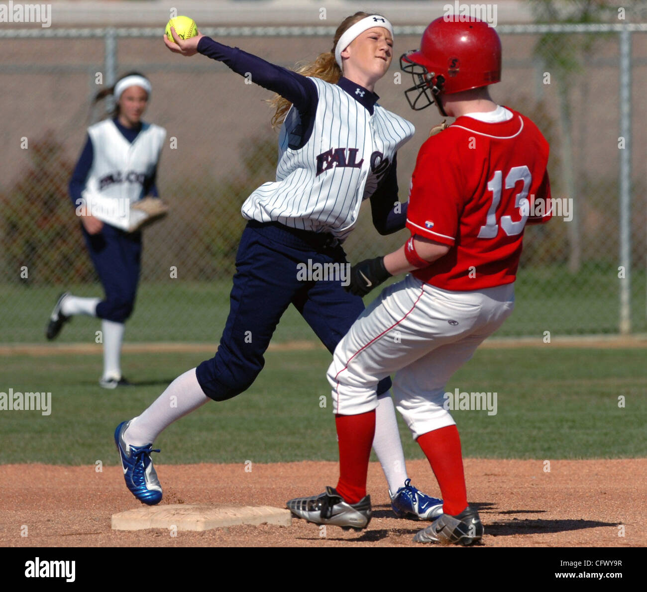 Freedom's Kim Westlund, left, gets the force out at second base on ...