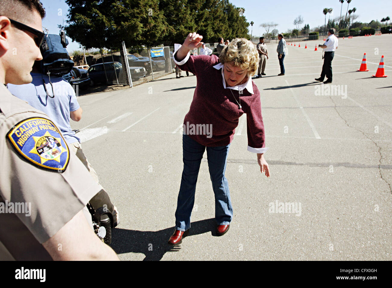 Robin Crocker stumbles while performing a practice field sobriety test ...
