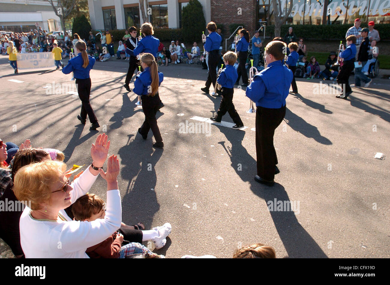 Kathy Goddard with her grandson Jonas Magnusson, 2, applaud as the ...