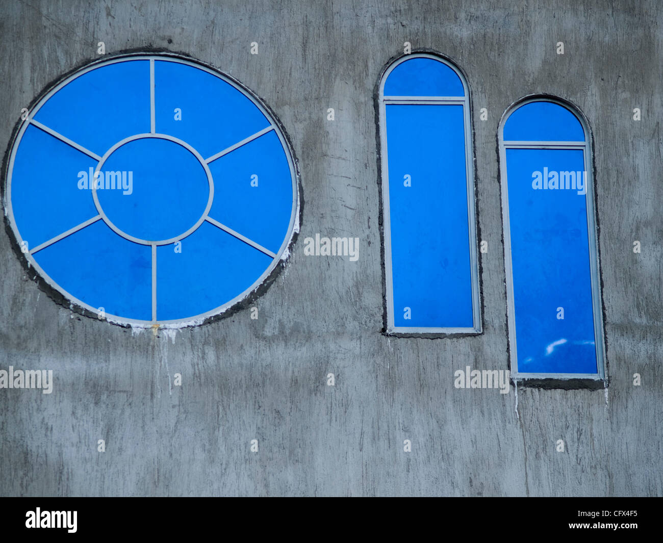 Windows reflect the blue sky n Santiago Atitlan, Guatemala Stock Photo ...