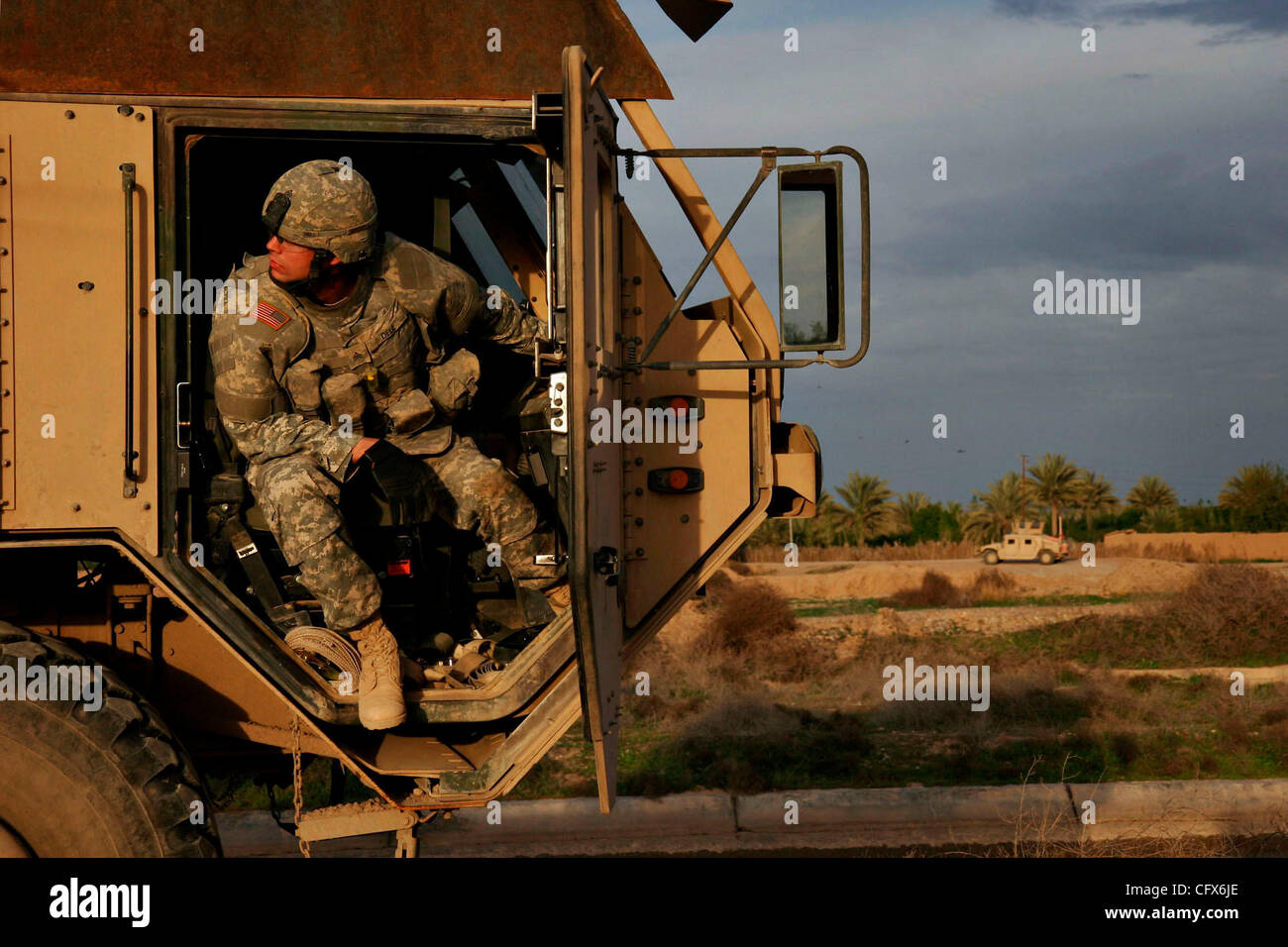 Mar 26, 2007 - Shakarah, Diyala, IRAQ - Sgt. SEAN DELL, of Waco, looks ...