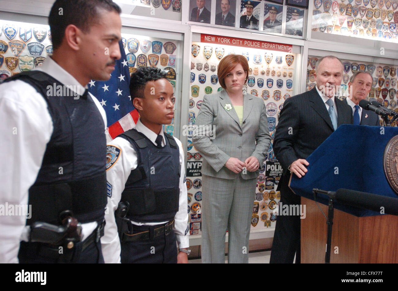 Det. Jose Estevez (L )and Sgt. Stephanie Moses (2nd from L) model the ...