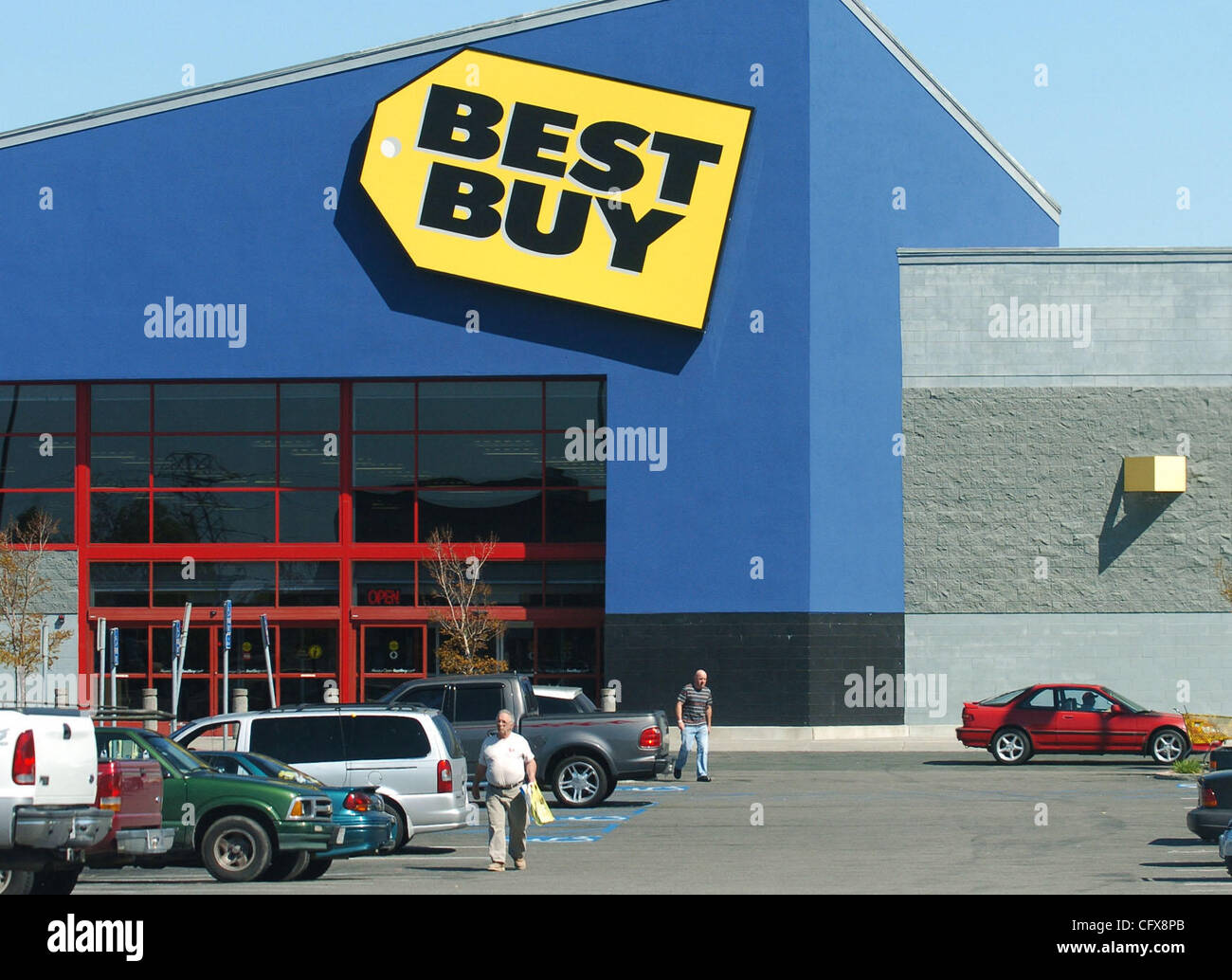 Shoppers leave from Best Buy store on Wednesday, March 28, 2007, in ...