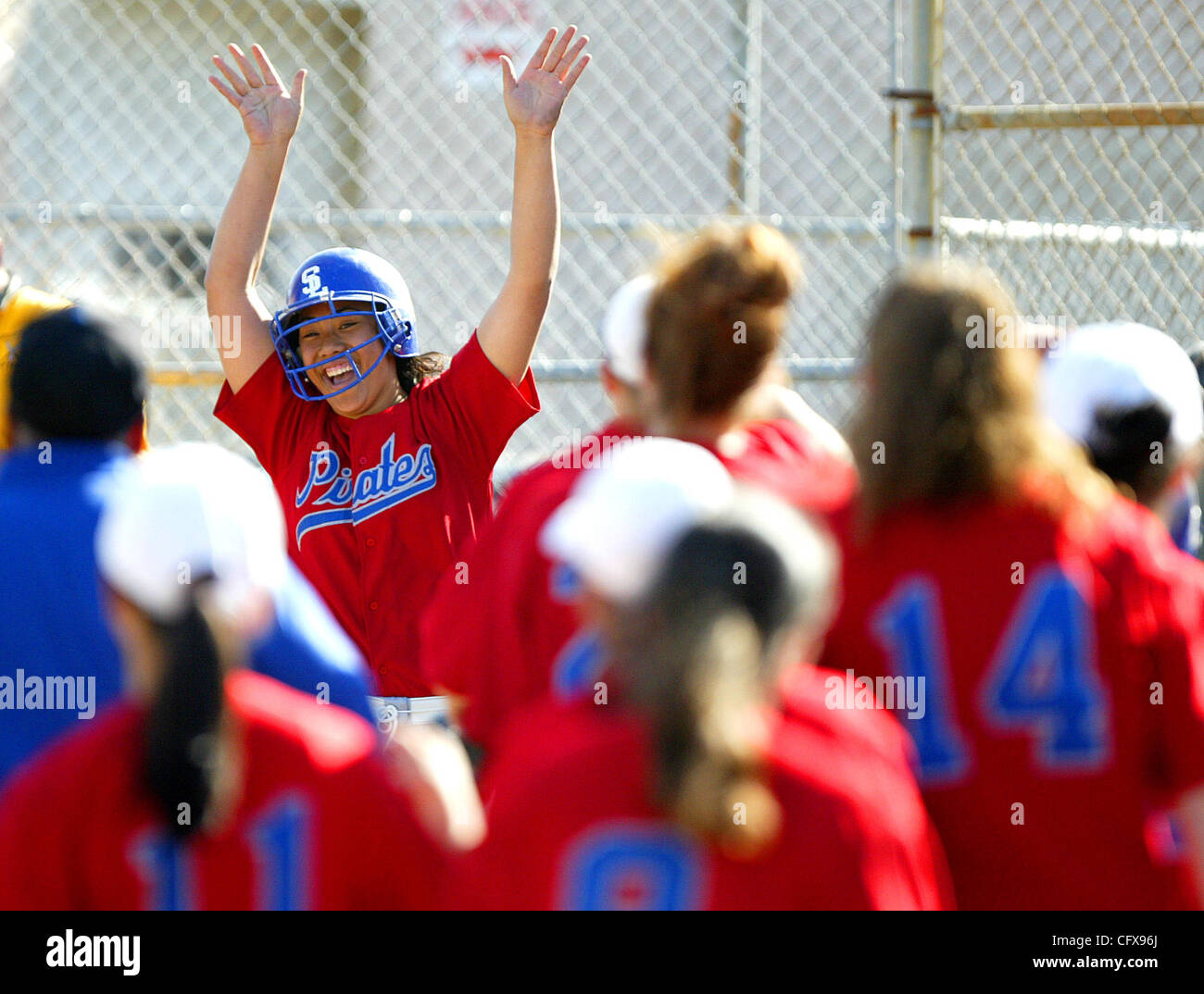 San Leandro's Tootsie Aliifua celebrates with her teammates after ...