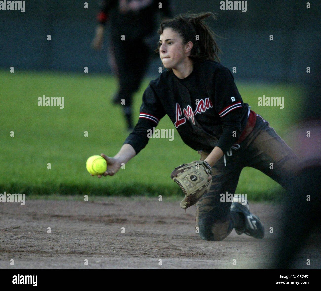 Logan's #2 Alex Stange second base underhands the ball to second for ...