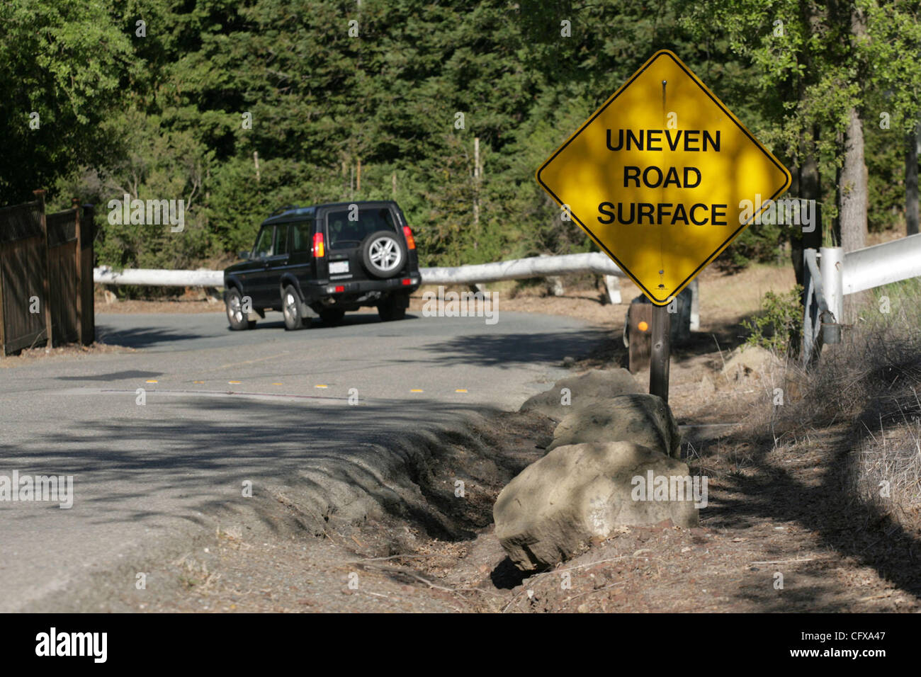 A sign warning of uneven roads on South Gate rd in unincorporated ...