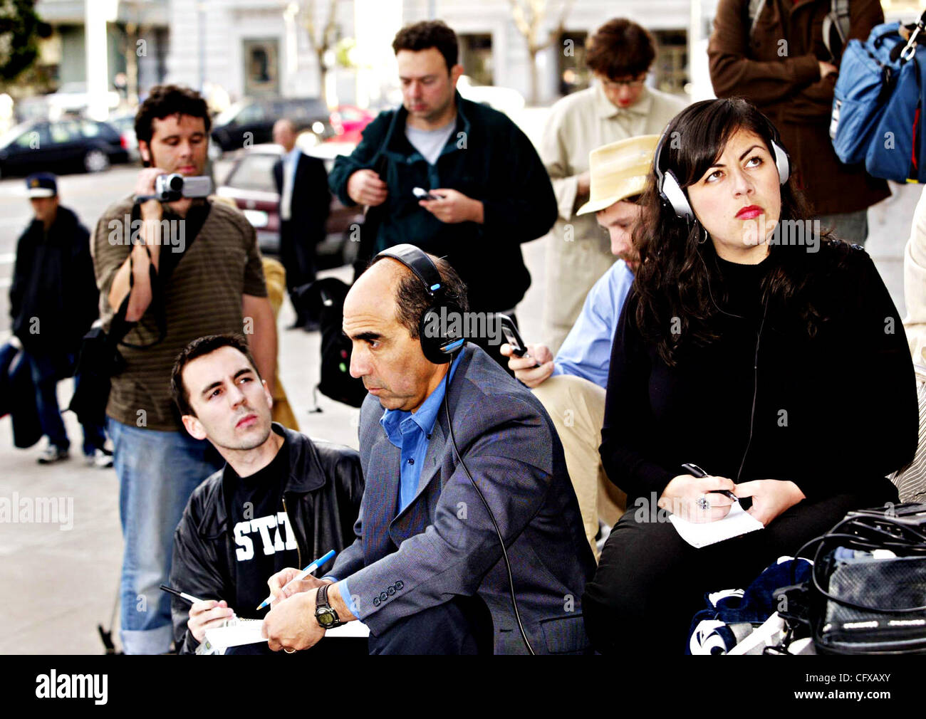 Journalists from several media outlets take notes of independent ...