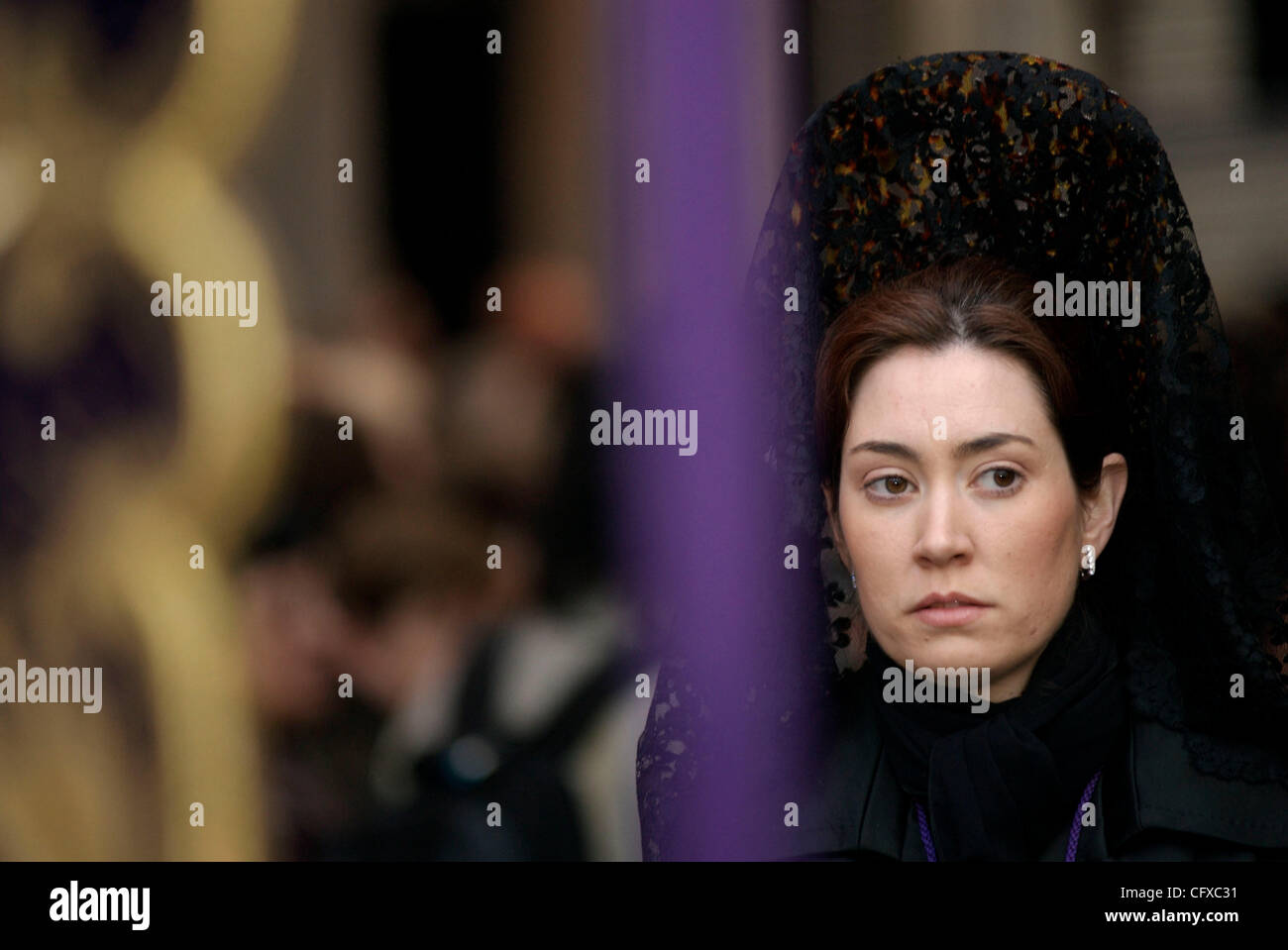 A woman wearing the traditional ornamental Spanish head covering ...