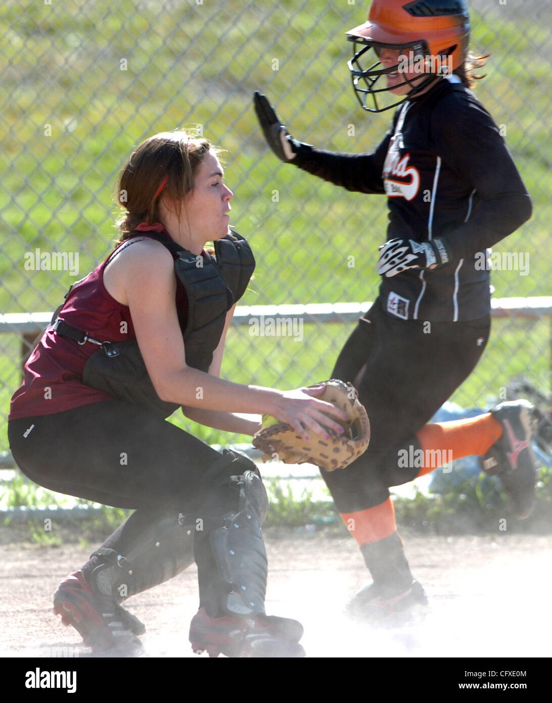 Mills High School athlete Gina Villeggiante, left, tags out Meagan ...