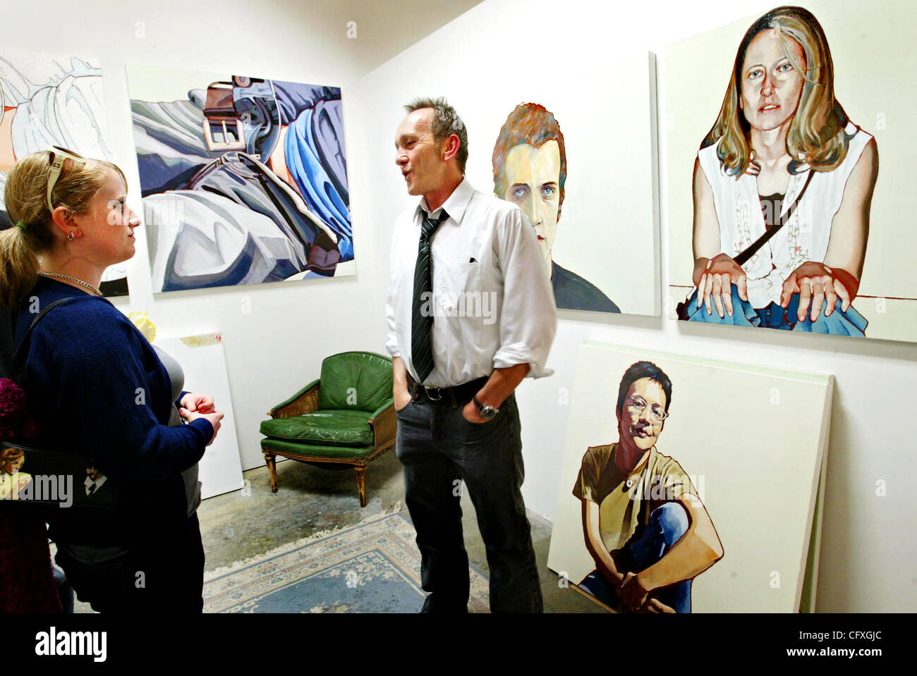 Artist Terry Furry, right, talks to guest Mary Younkin of Oakland at ...
