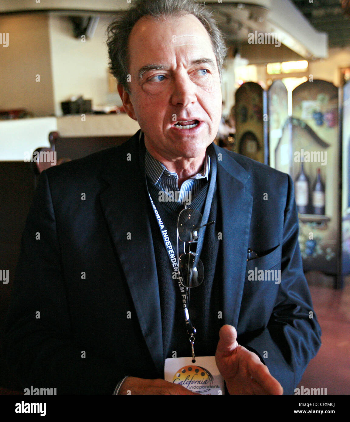 Actor Gregory Itzen talks to a reporter during the opening night ...