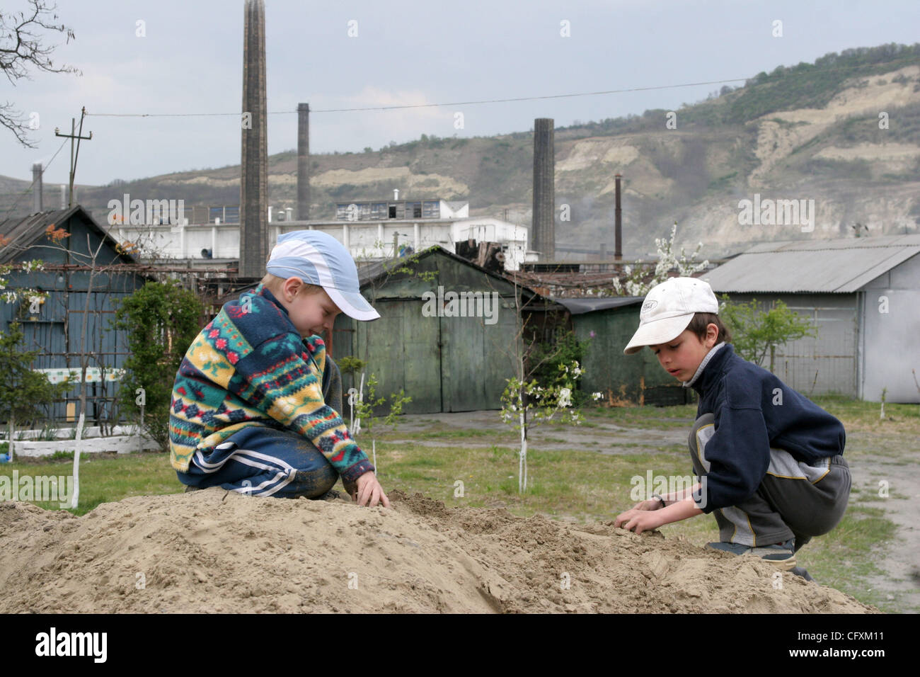 Apr. 18, 2007 - Copsa Mica, Transylvania, Romania - Children play with ...