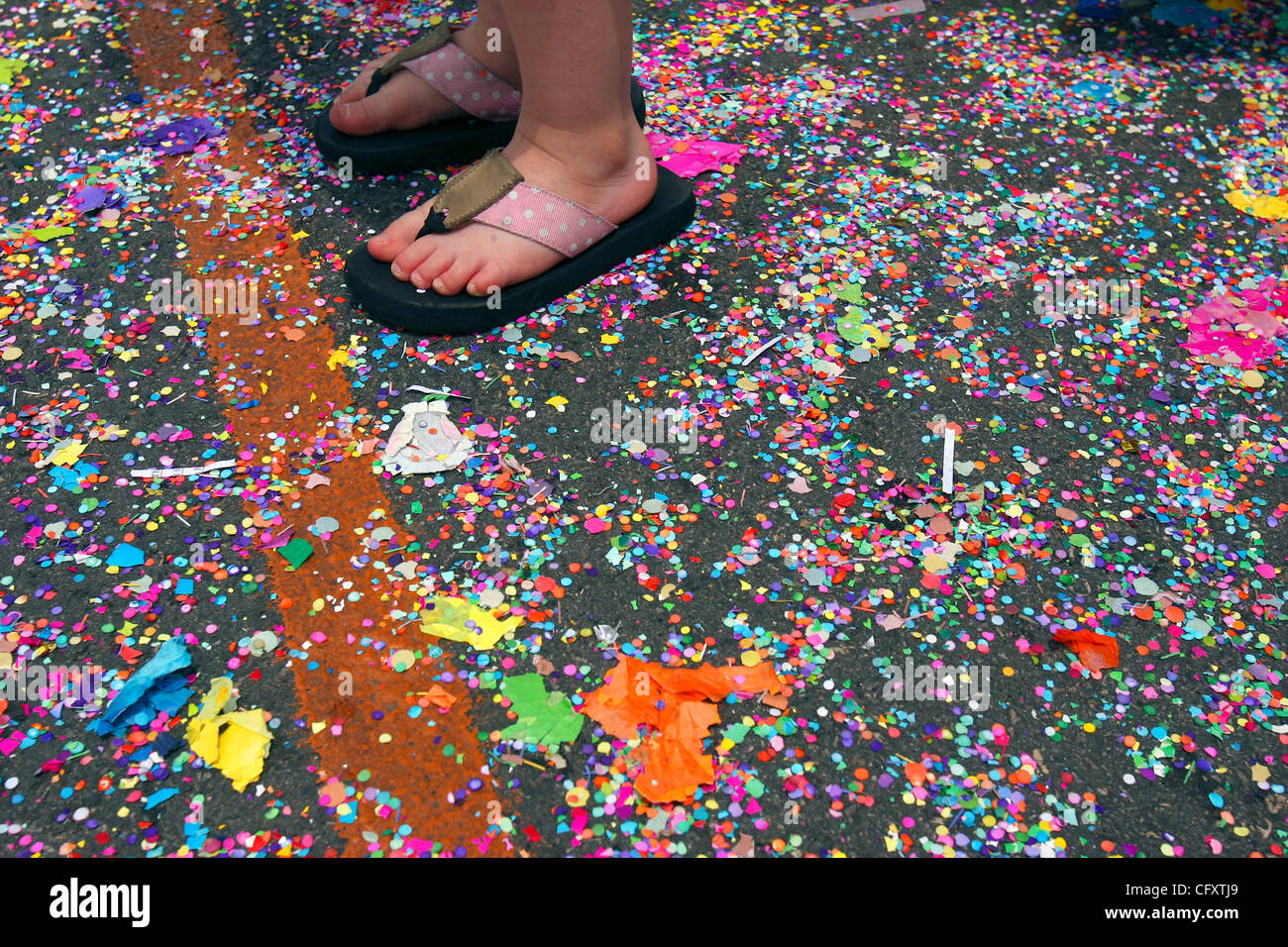 1:50PM Caroline Downing, 3, stands in confetti as she watches the ...