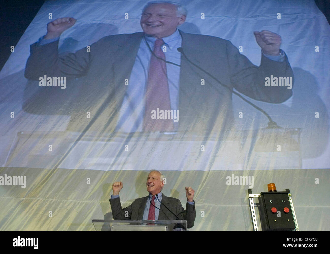Delta Air Lines CEO Gerald Grinstein raises his arms during a post ...